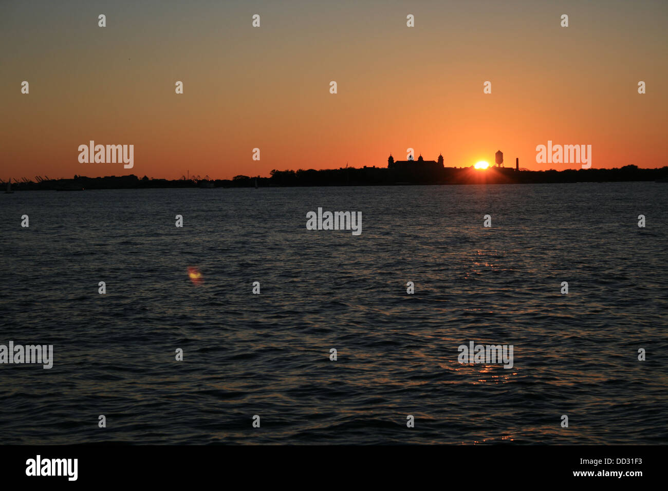 Sunset over Ellis Island, New York Harbour Stock Photo - Alamy