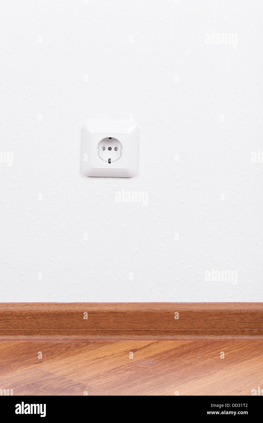 Electrical outlet on white wall Stock Photo - Alamy