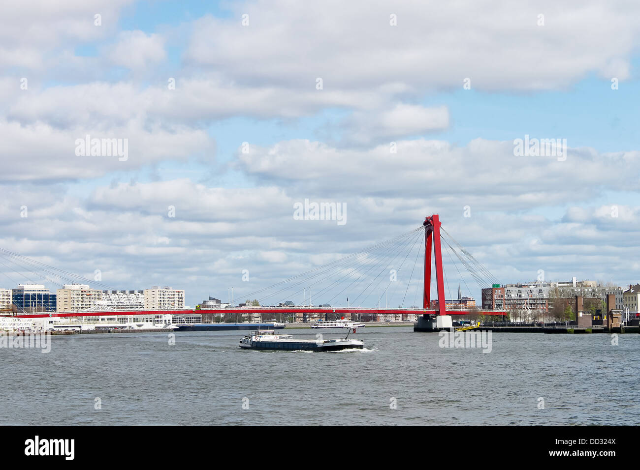 Red suspension bridge over Maas in Rotterdam. The Netherlands Stock ...