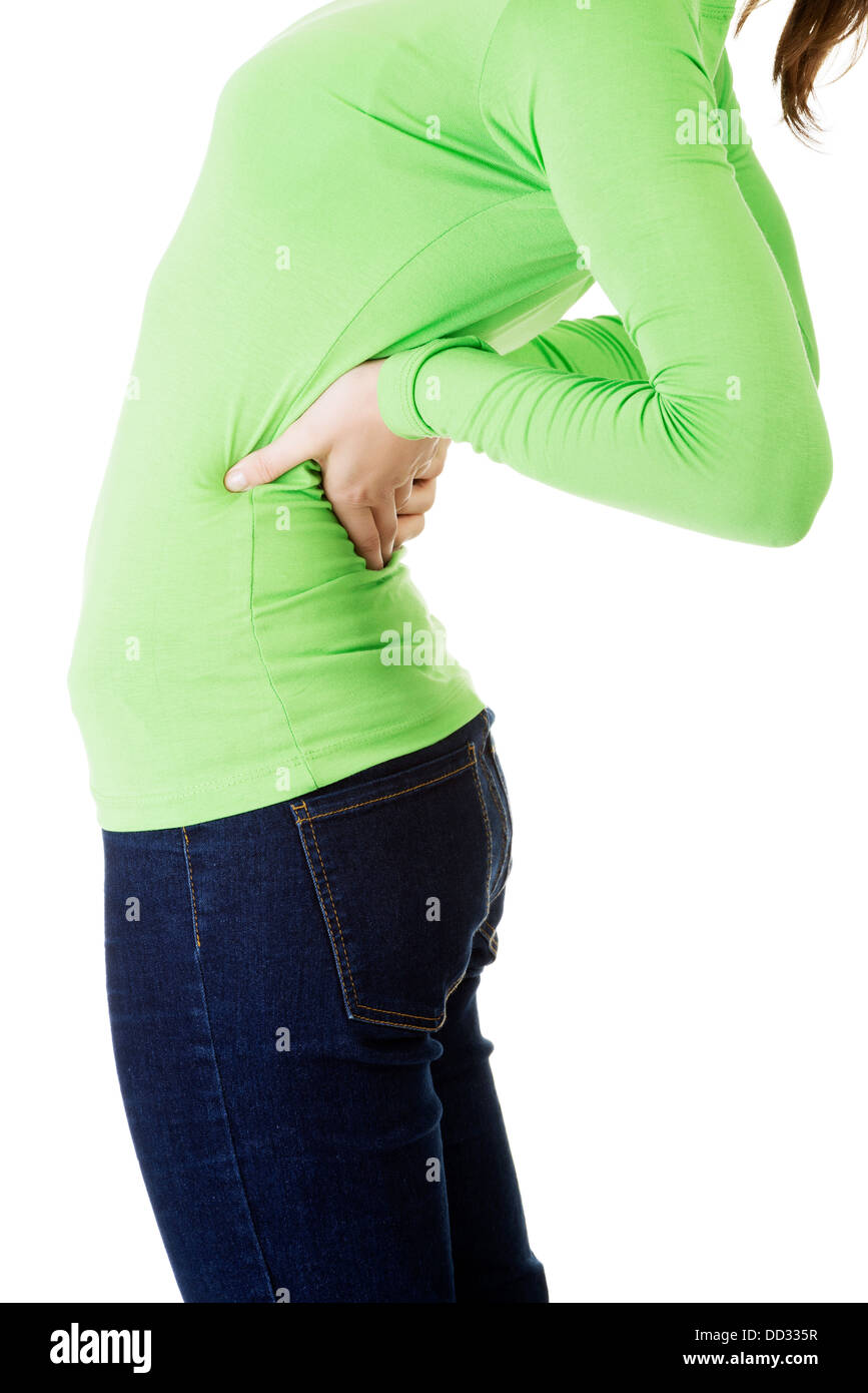 Teen student woman with back pain isolated Stock Photo - Alamy