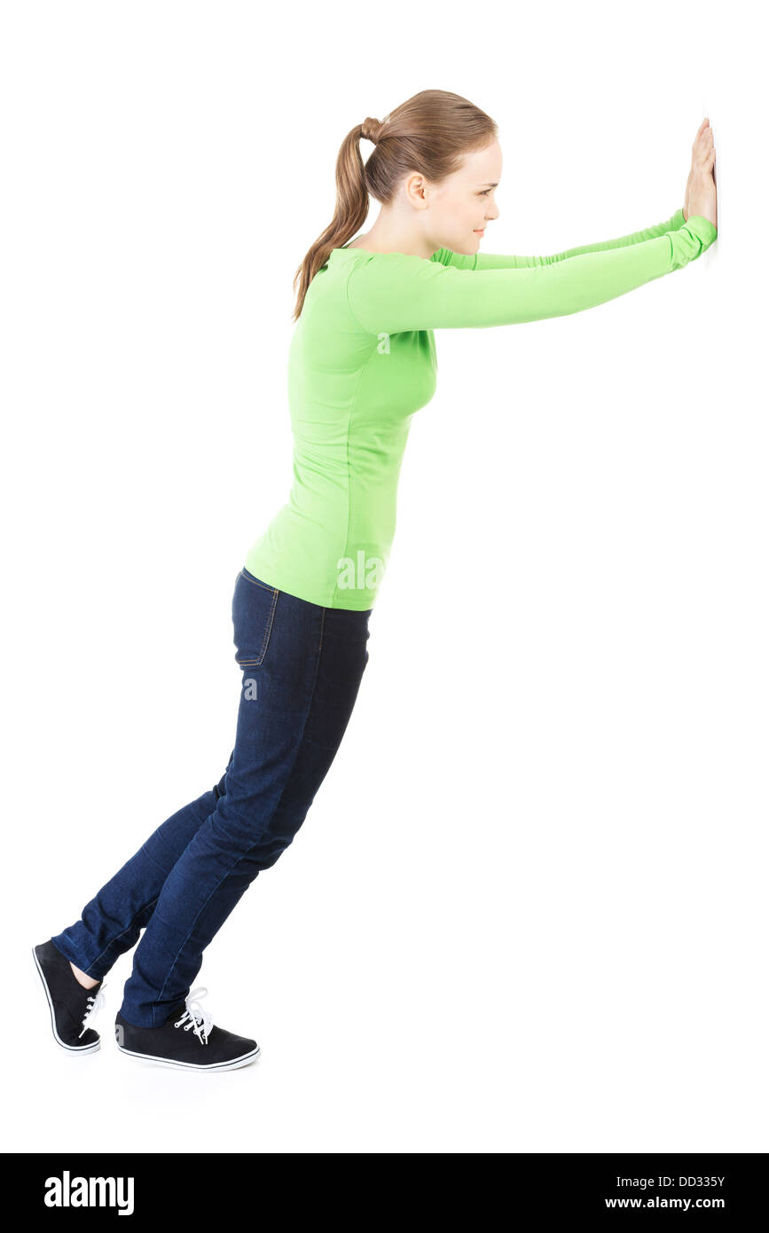 Girl pushing wall hi-res stock photography and images - Alamy