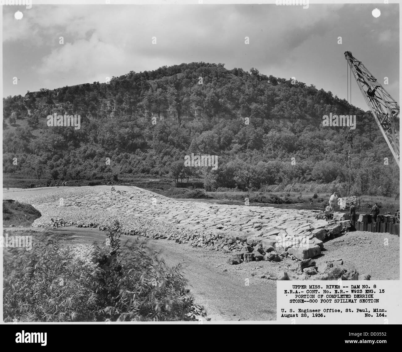 Photograph showing a portion of completed derrick stone and an 800-foot ...