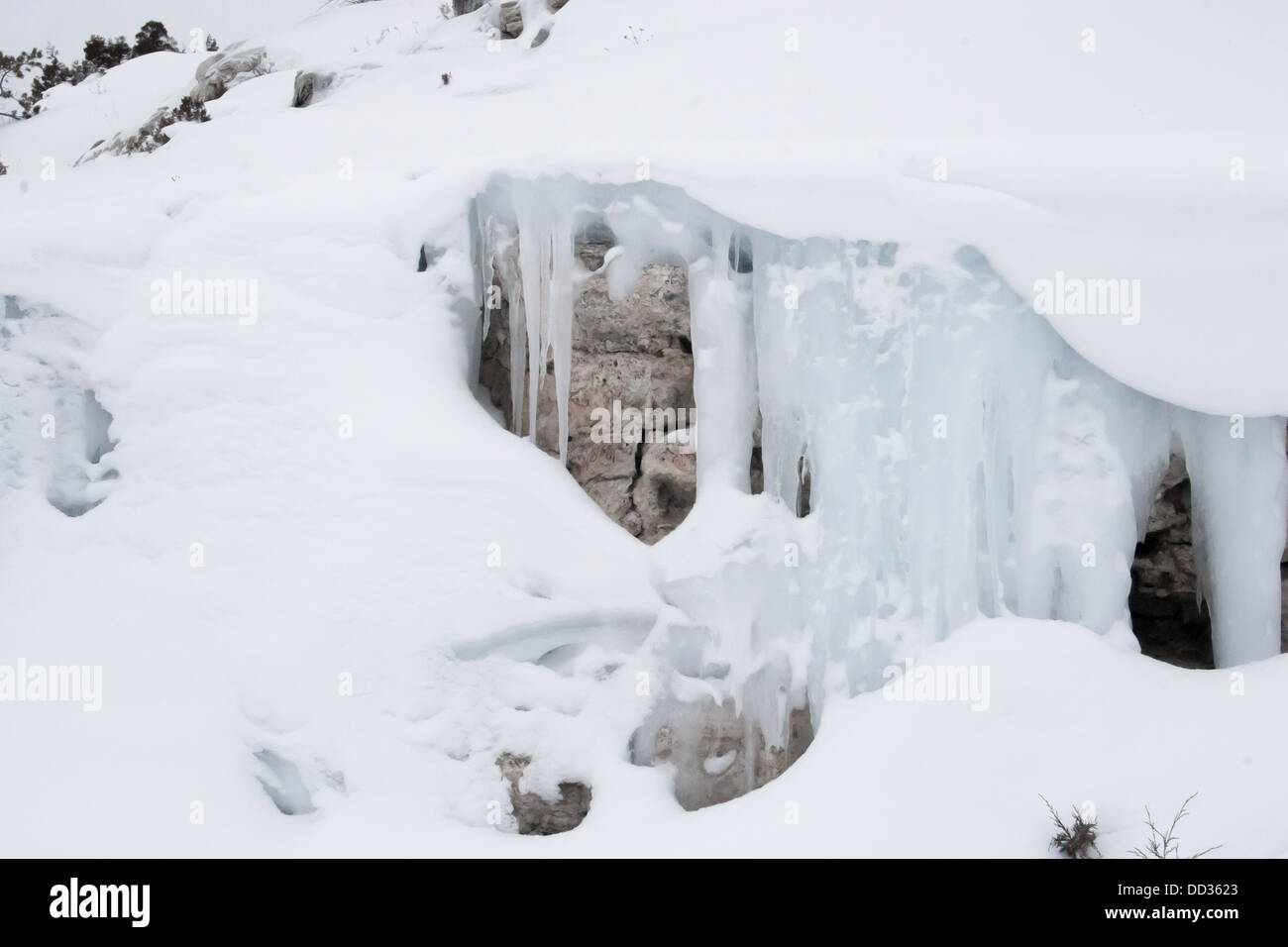 Snow and ice covering rocks Stock Photo - Alamy