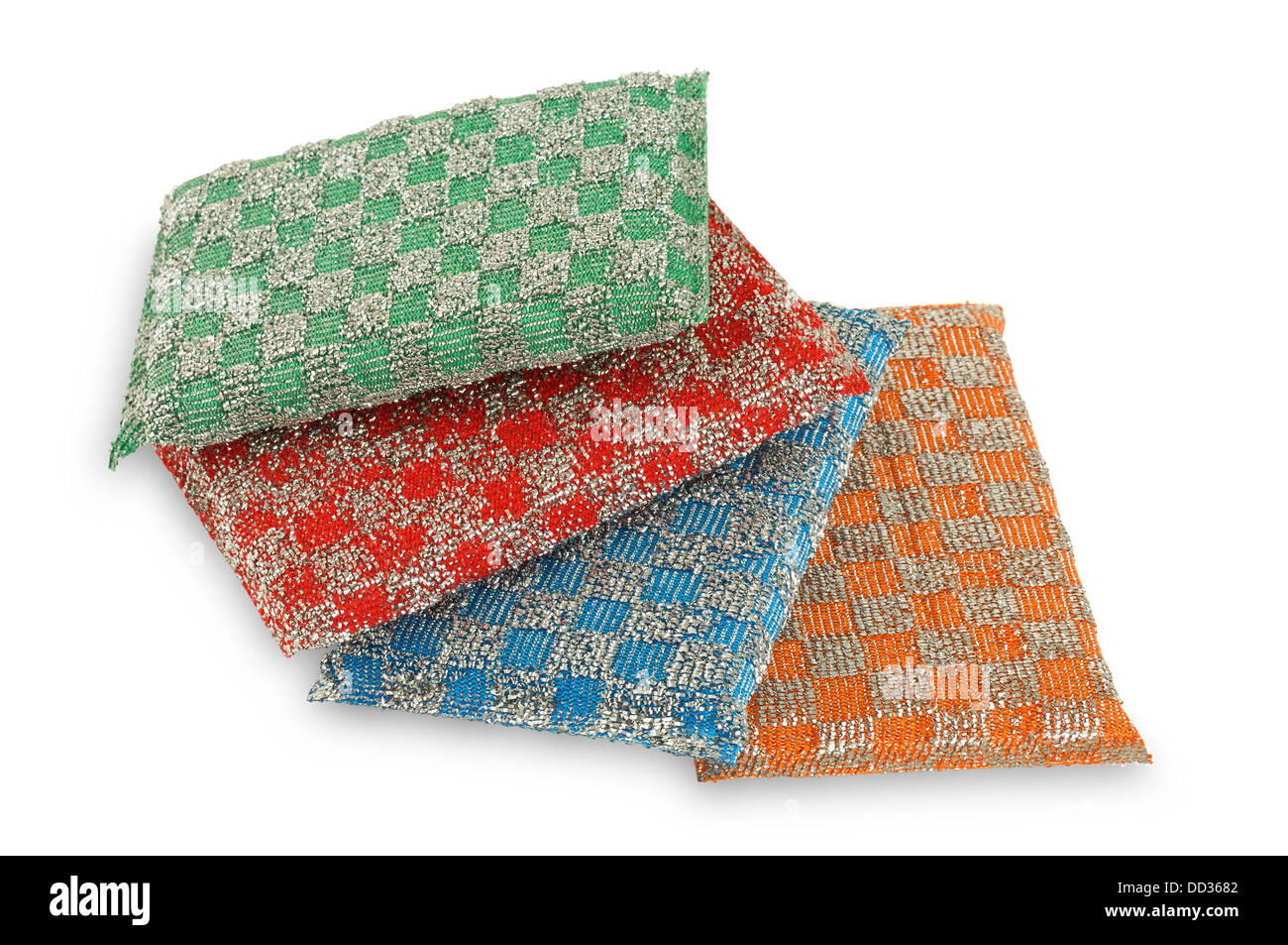 Plastic sponges of different colors with metal threads on white closeup ...