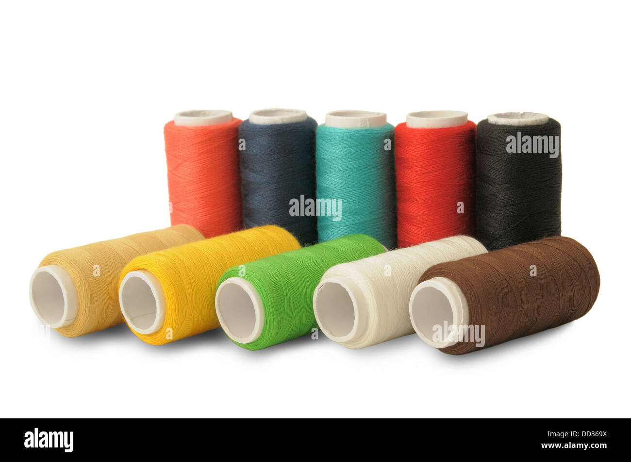 Spools of threads of different colors on white Stock Photo - Alamy