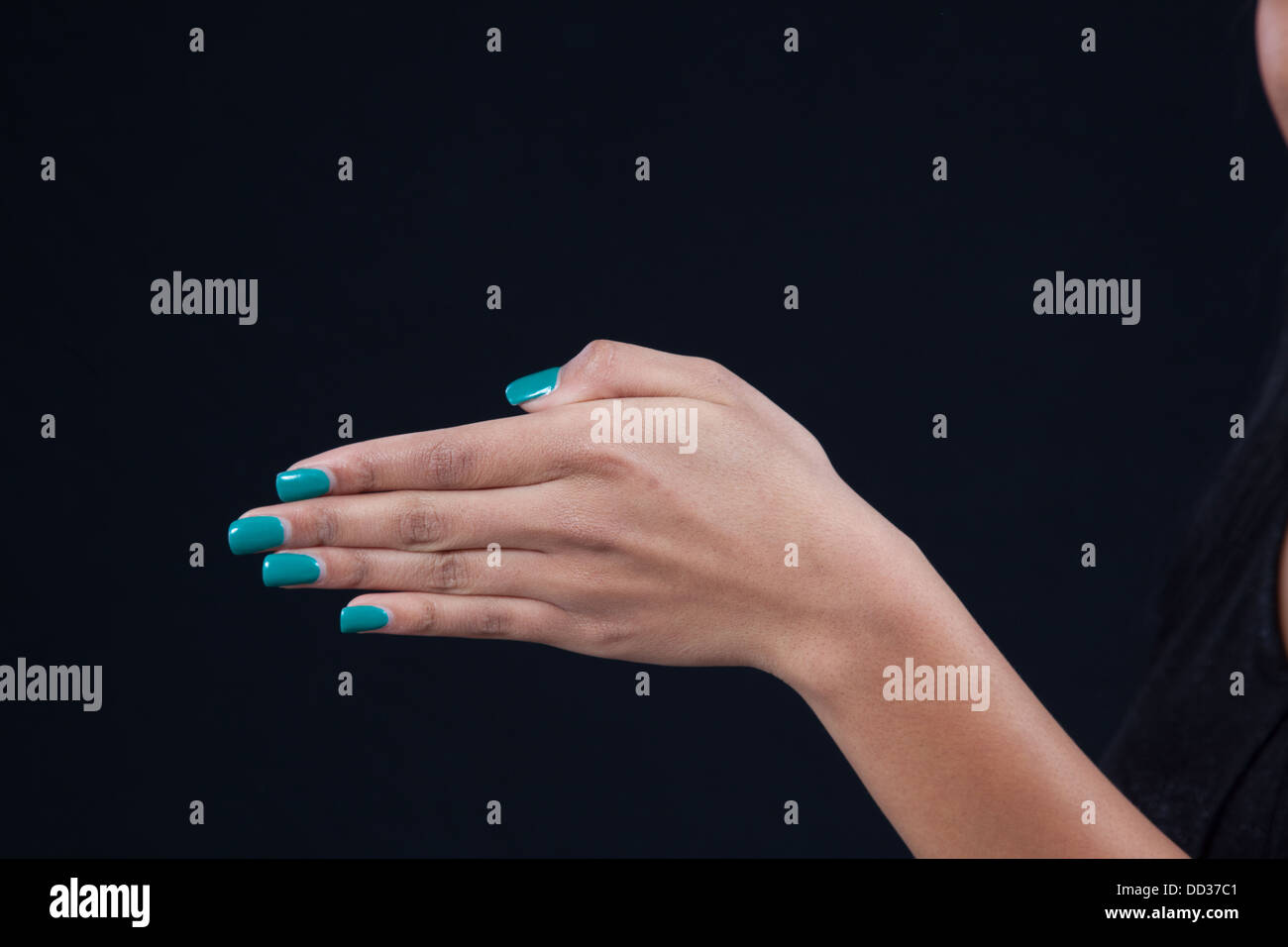 Woman's hand with fingers to the left Stock Photo - Alamy