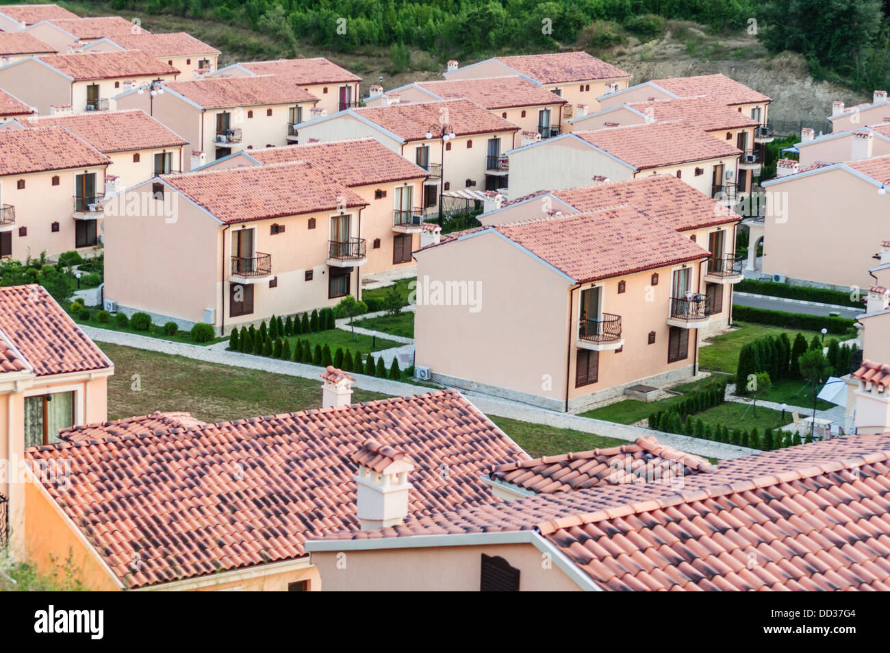Nice neighborhood with tile roofed homes Stock Photo - Alamy