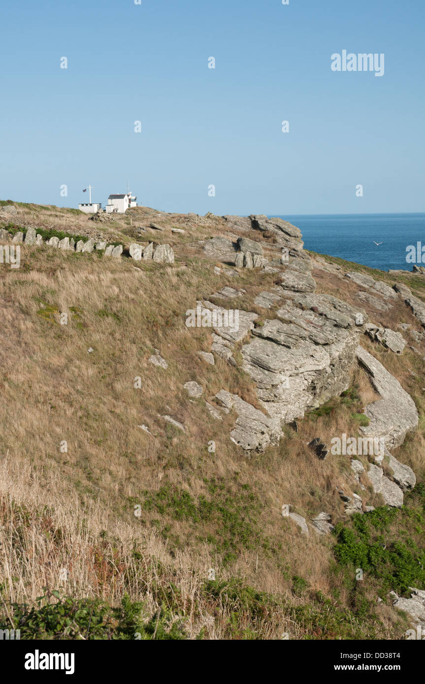 Distant view of Prawle Point National Coastwatch lookout station with ...