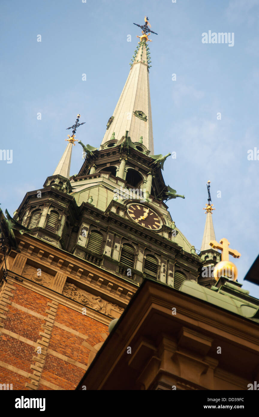 Clock Tower And Crosses At The Top Of A Building In Old Town; Stockholm ...