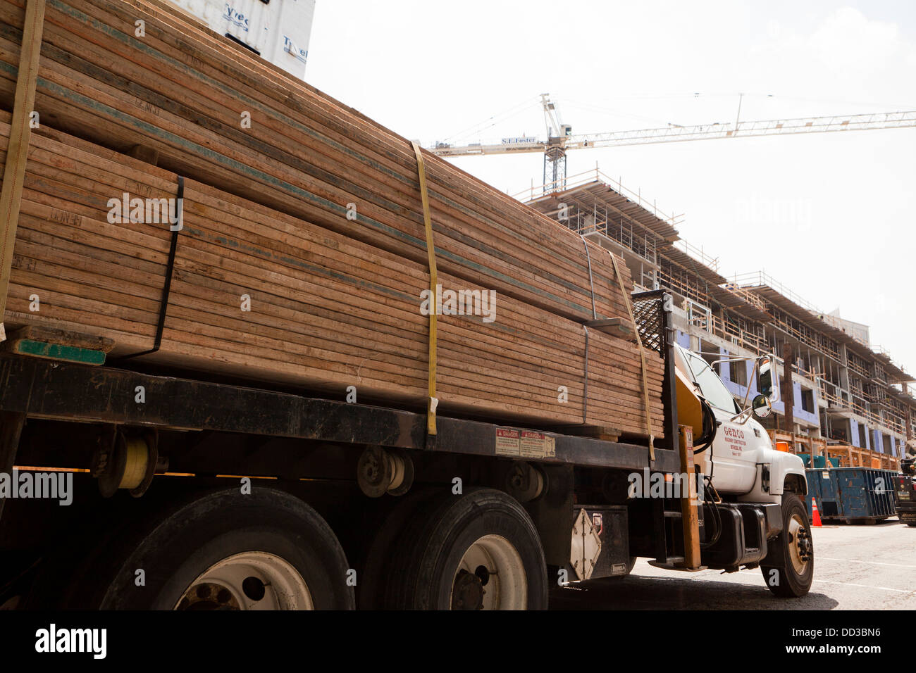 Lumber truck at construction site Stock Photo - Alamy
