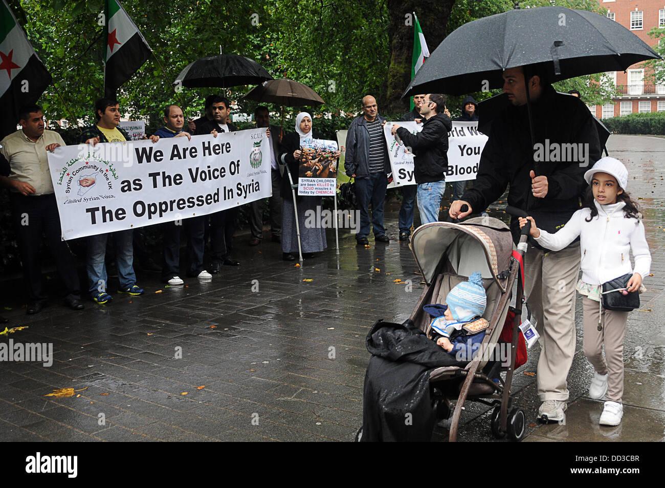 London25th August 2013 : Protesters holding a placards protest against ...