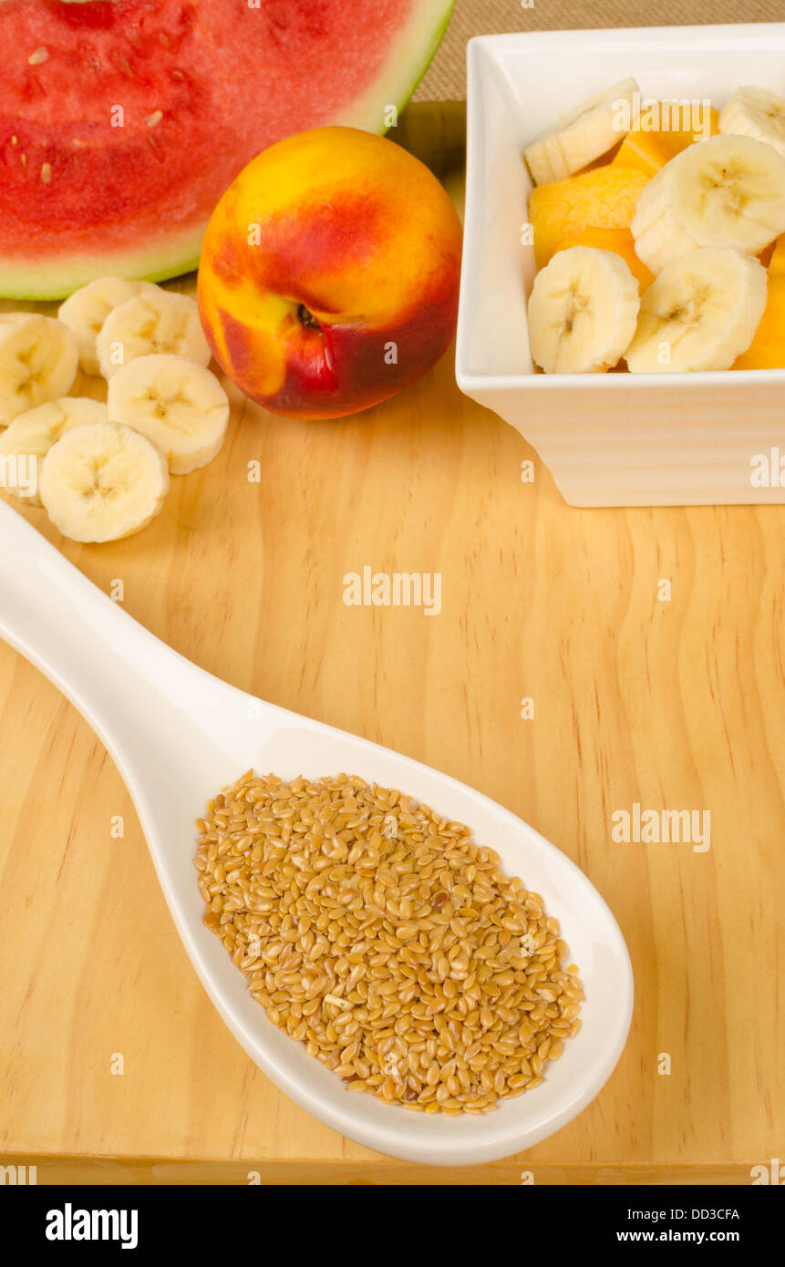 Linseed and fresh fruit, a healthy breakfast Stock Photo - Alamy