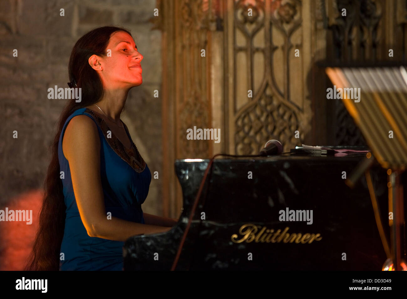 Jazz pianist Zoe Rahman playing with her band in Brecon Cathedral ...
