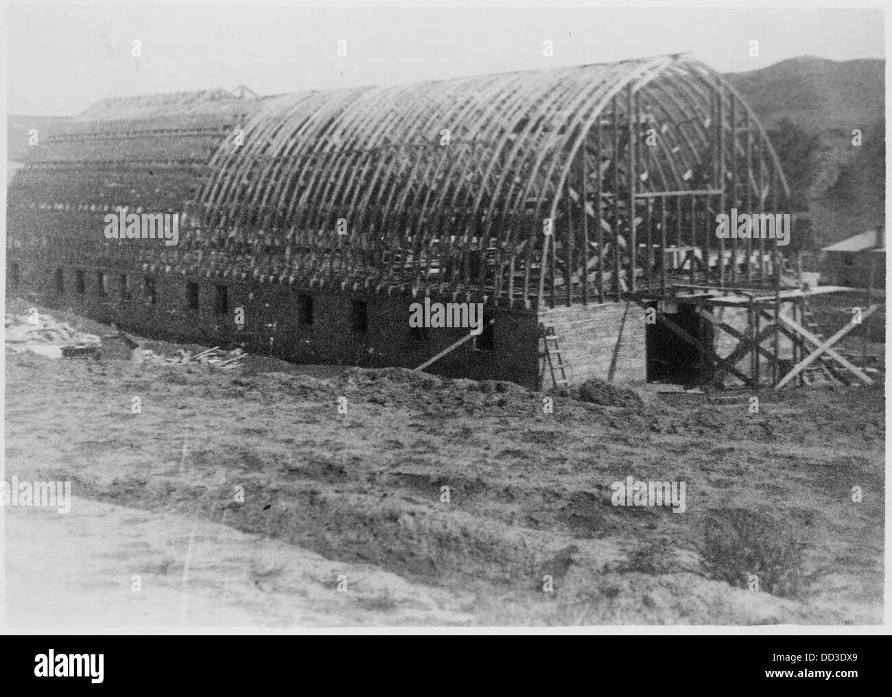 The framework of the Rising Hail barn is under construction, marking ...