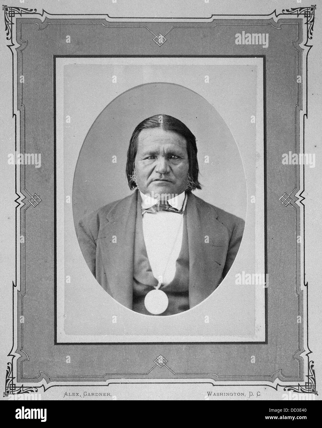 A historical photograph of a member of the Apache tribe, named Santo ...