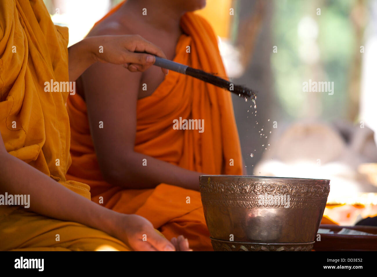 Buddhist monks in blessing ceremony at Bayon Temple, Angkor Thom ...