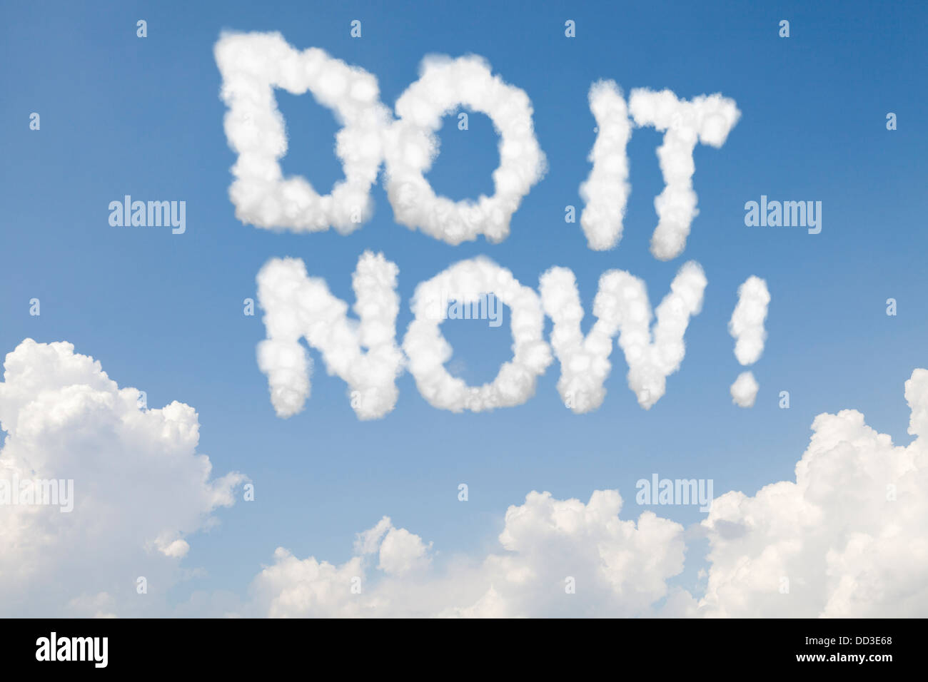 Do it now concept text words in clouds on blue sky Stock Photo - Alamy