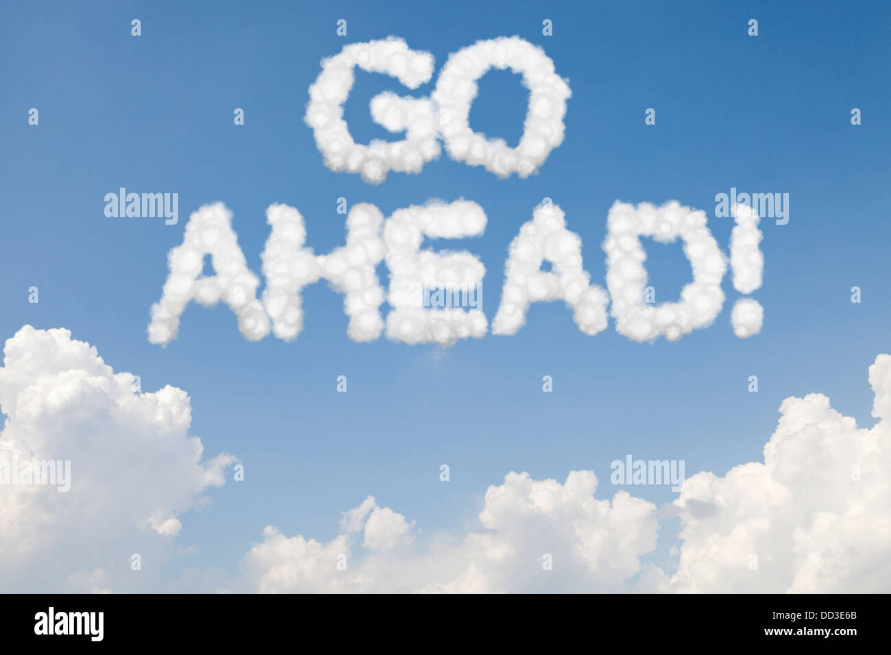Go ahead concept text in clouds on blue sky Stock Photo - Alamy