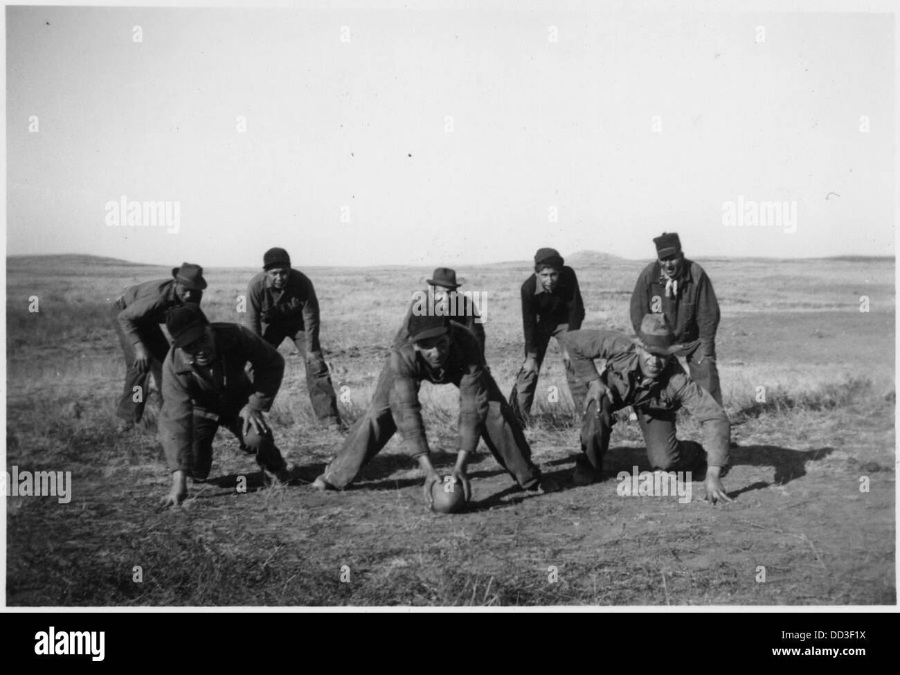 A six-man football team from Camp 166, likely a military or training ...