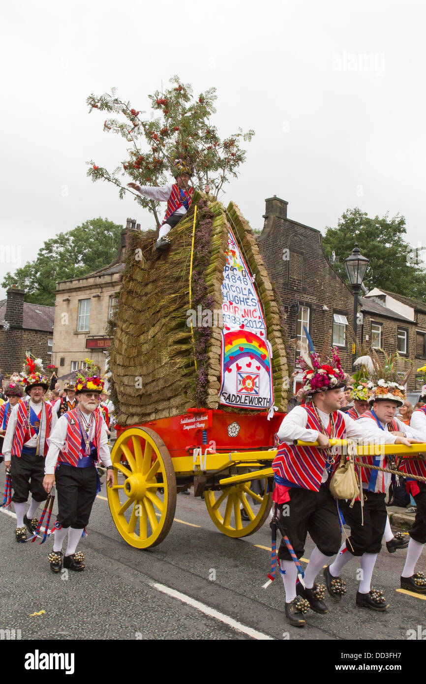 Morris dancers pulling the cart at the Saddleworth Rushcart 2013 Stock ...