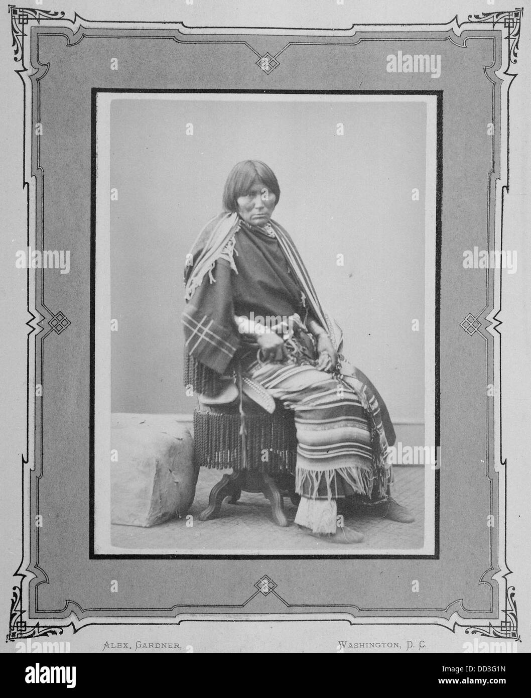 A historical image depicting a Kiowa woman, known as the Squaw of Lone Wolf, part of the Kiowa ...