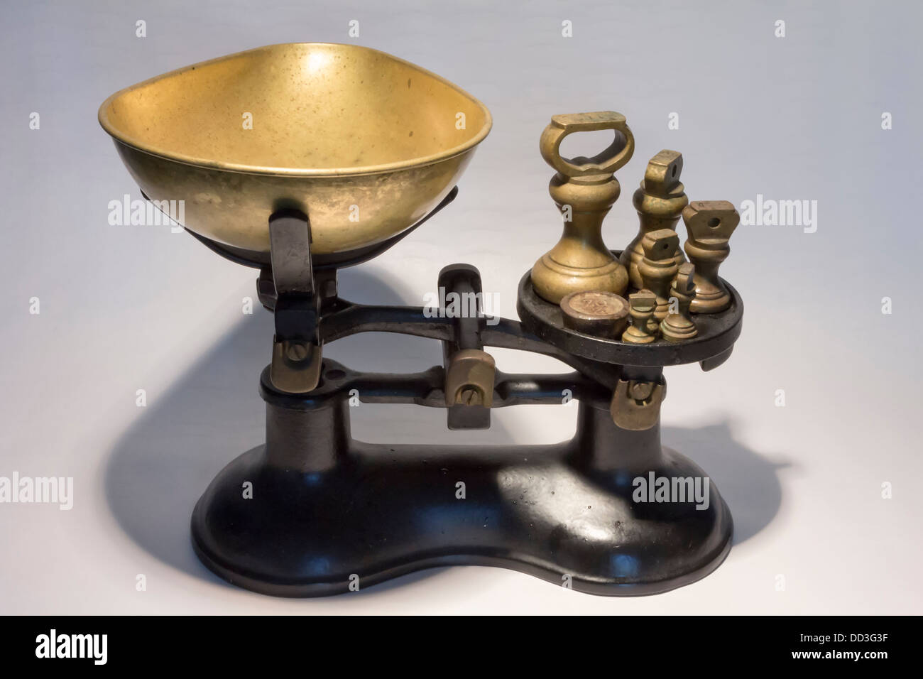 Old fashioned traditional weighing scales hi-res stock photography and ...