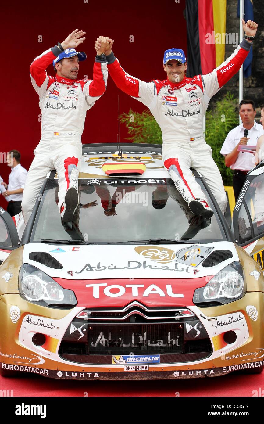 Spanish rally driver Dani Sordo (R) and his co-driver Carlos del Barrio ...