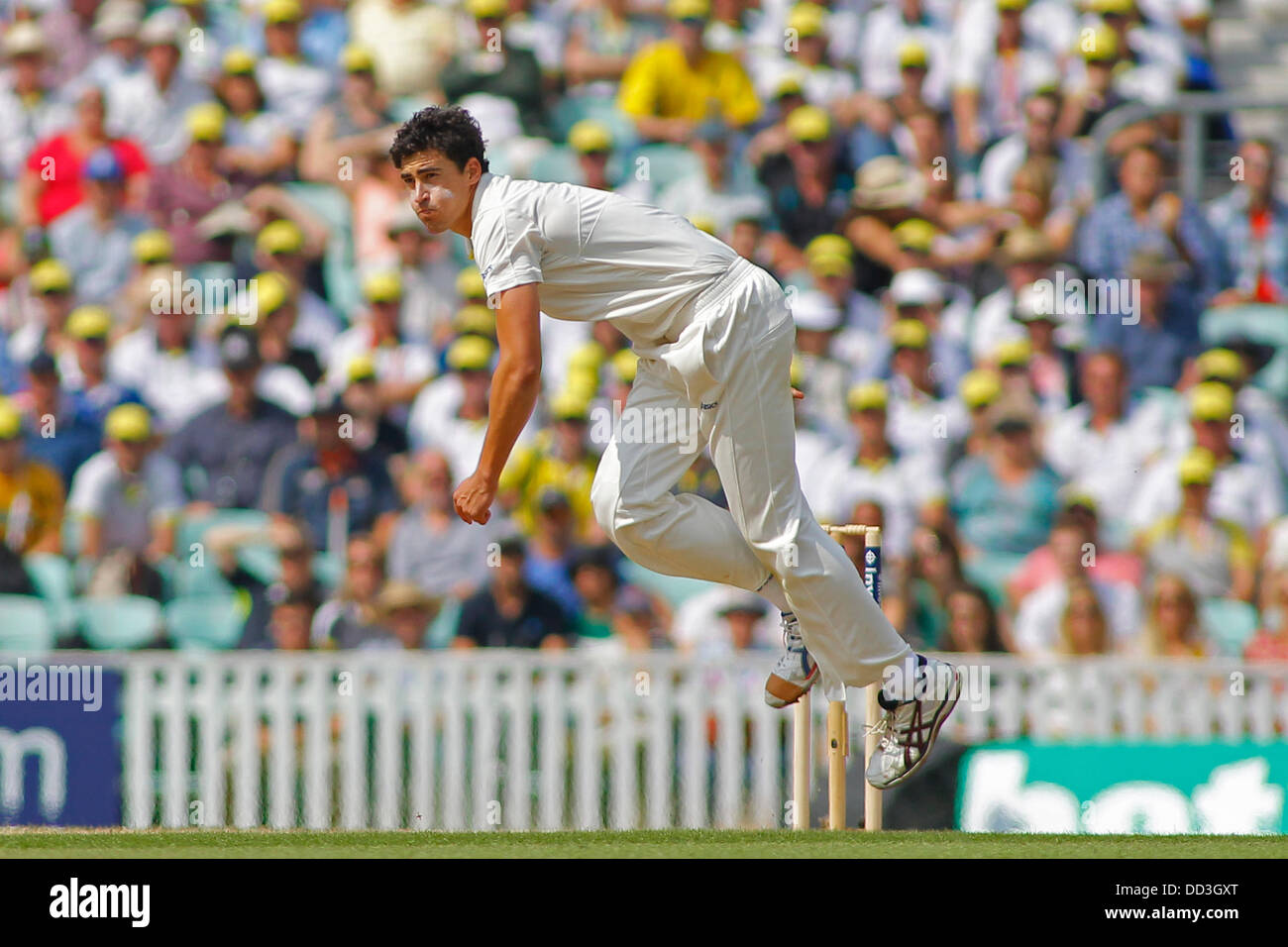 London, UK. 25th Aug, 2013. Mitchell Starc bowling during day five of ...