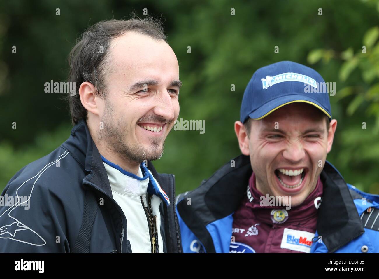 Polish rally driver Robert Kubica (L) and Belgian driver Nicolas ...