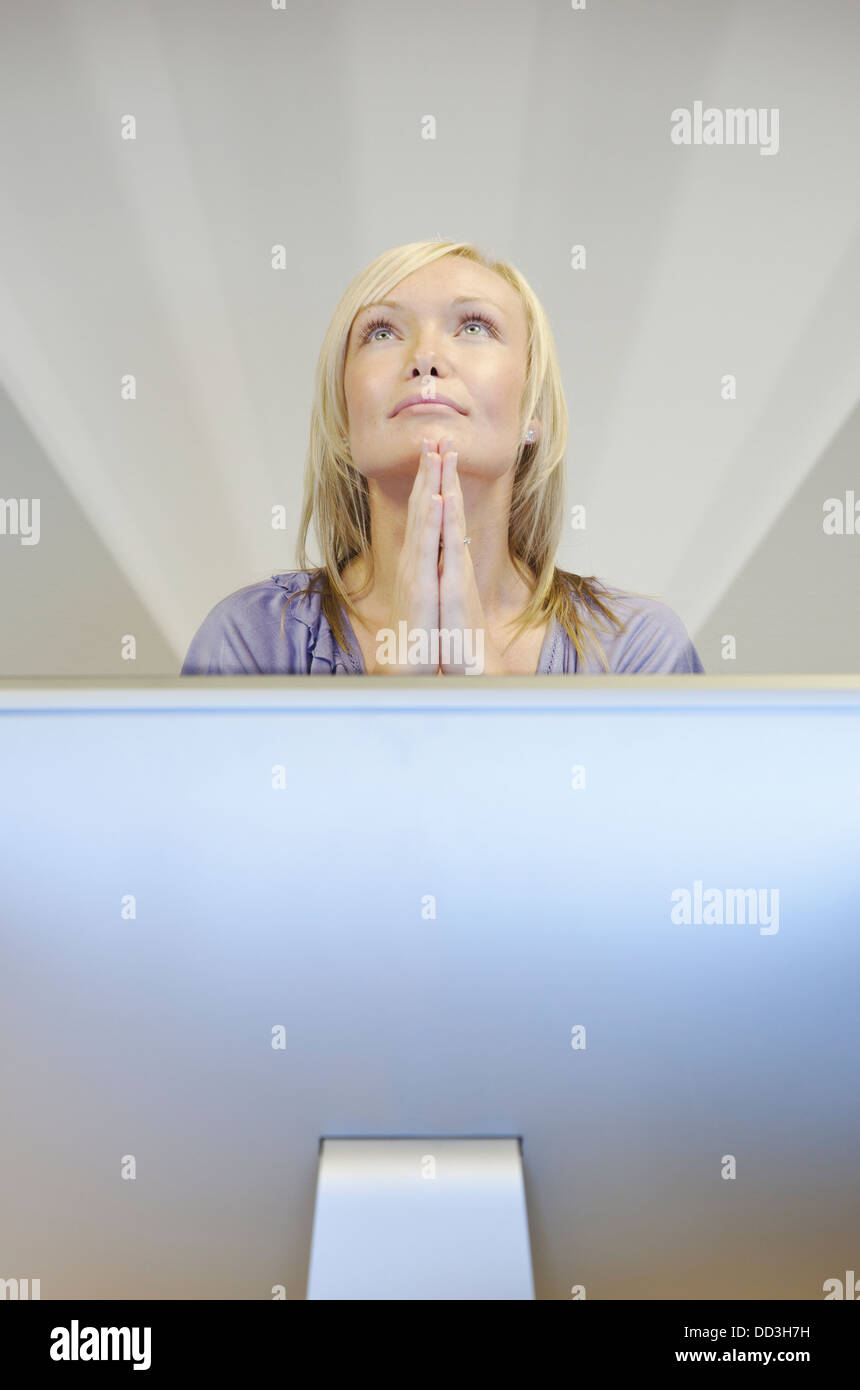 A Young Woman Finds Inspiration Behind Her Computer Screen; South ...