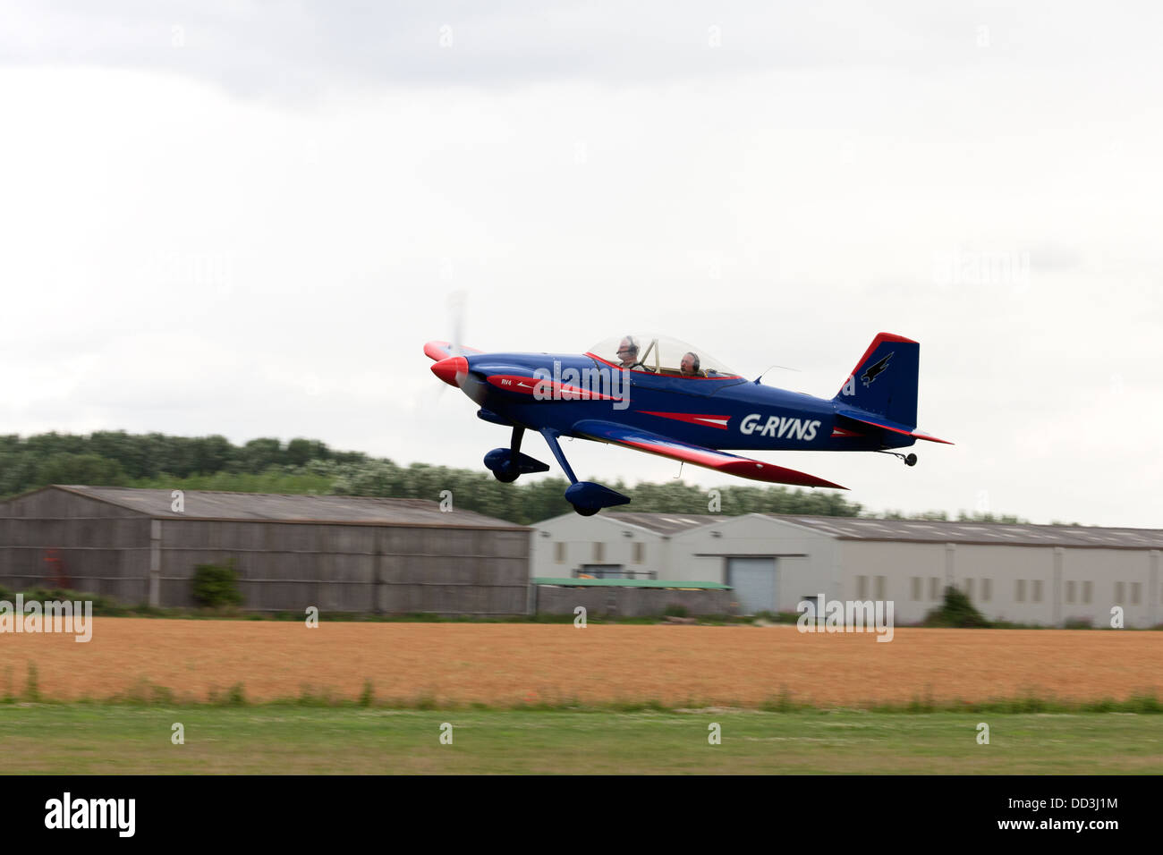 Vans RV-4 G-RVNS in flight taking-off from Breighton Airfield Stock ...