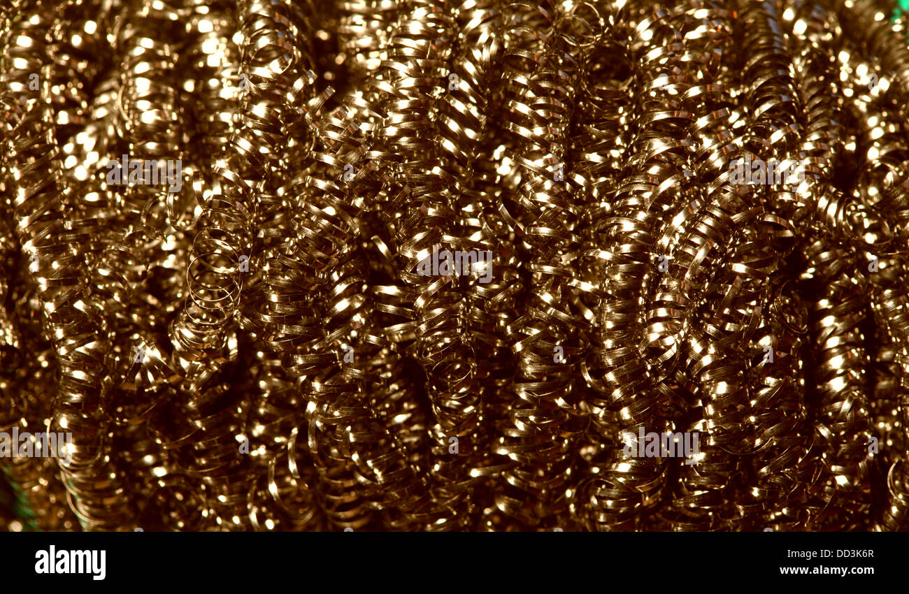 golden metallic steel pan scourer texture background Stock Photo - Alamy