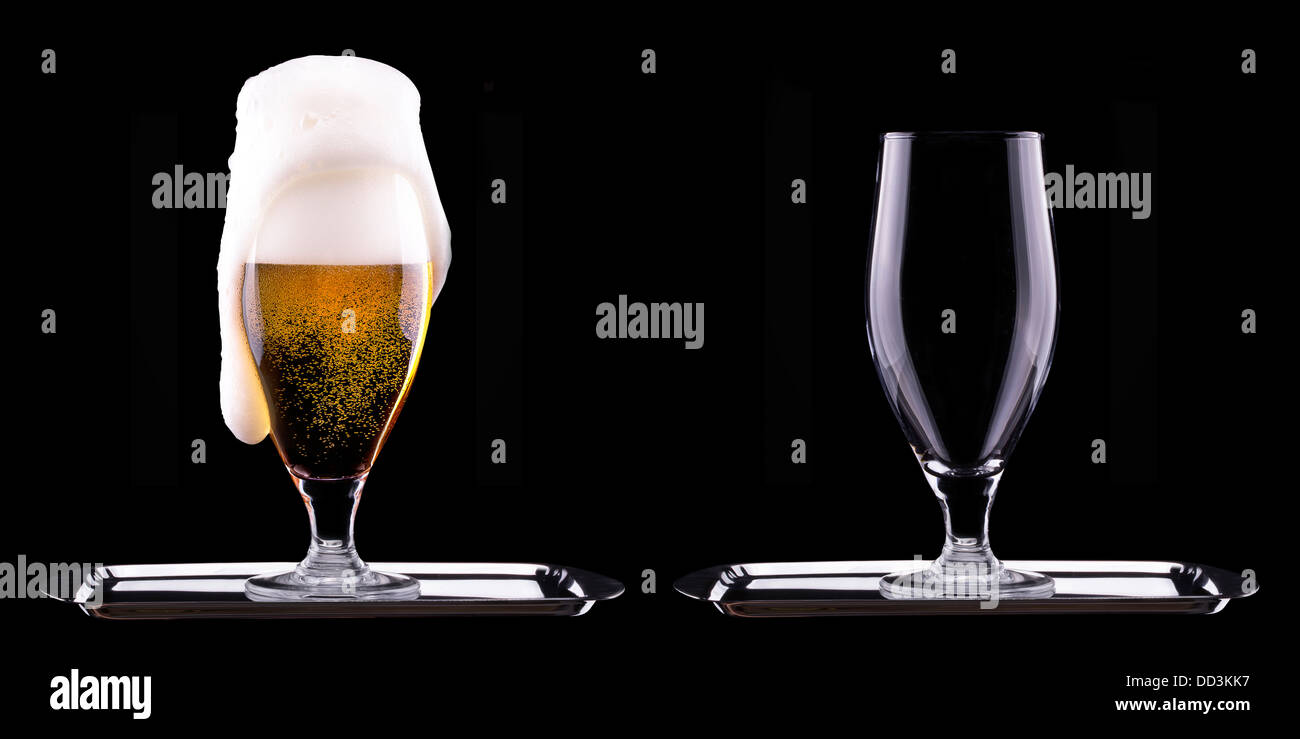 full and empty glass of light beer isolated on a black background Stock ...