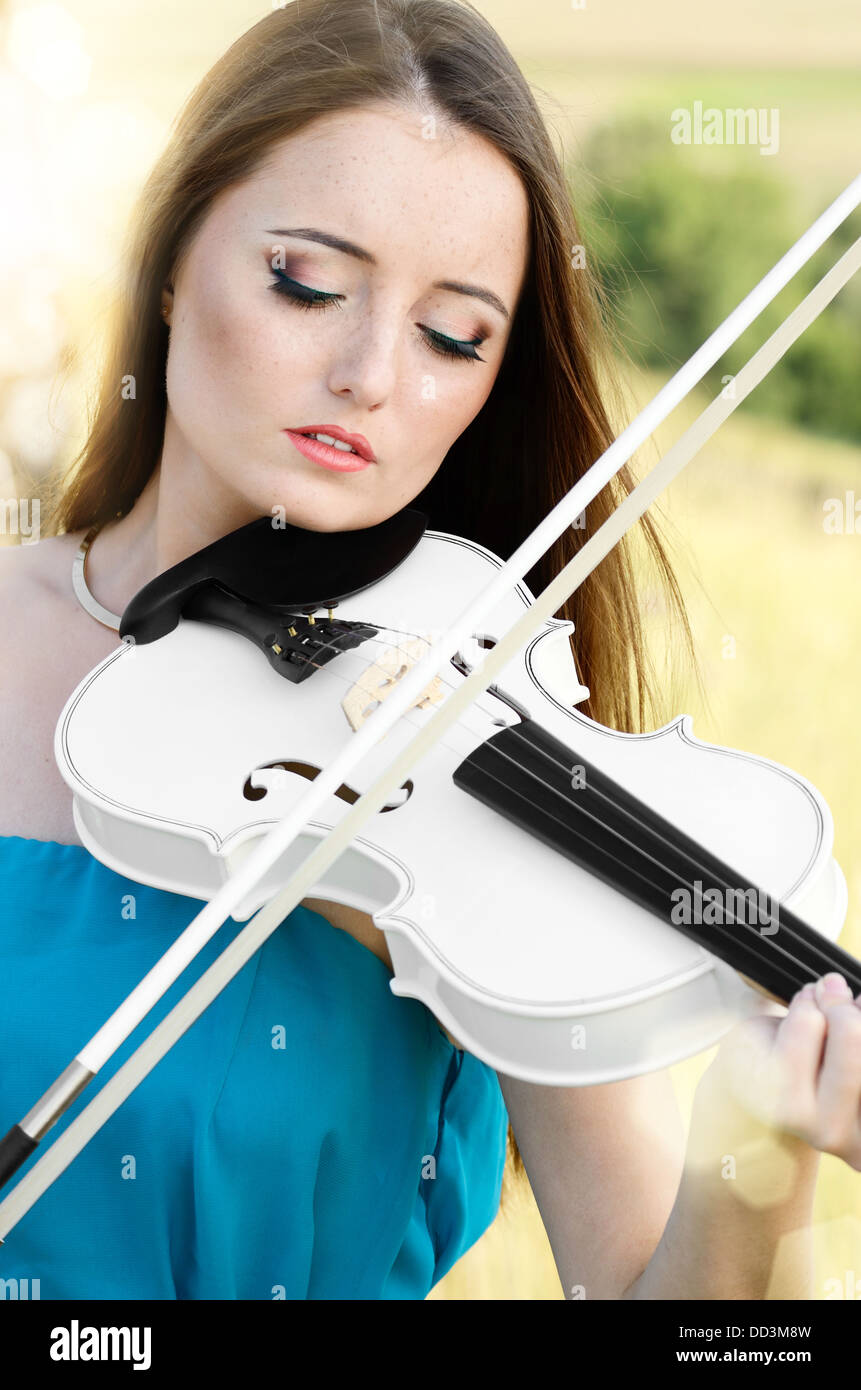 Woman fiddle hi-res stock photography and images - Alamy