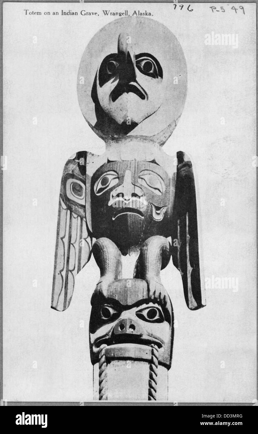 A totem pole marking an indigenous grave in Wrangell, Alaska ...