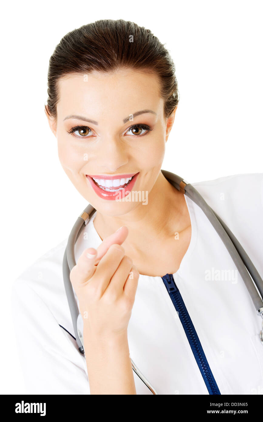 Female doctor pointing at the screen, isolated on white Stock Photo - Alamy