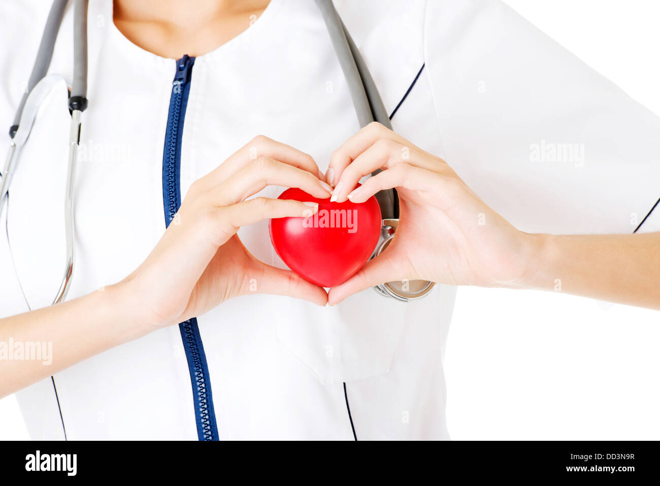 Young nurse with heart in her hand , isolated on white Stock Photo - Alamy