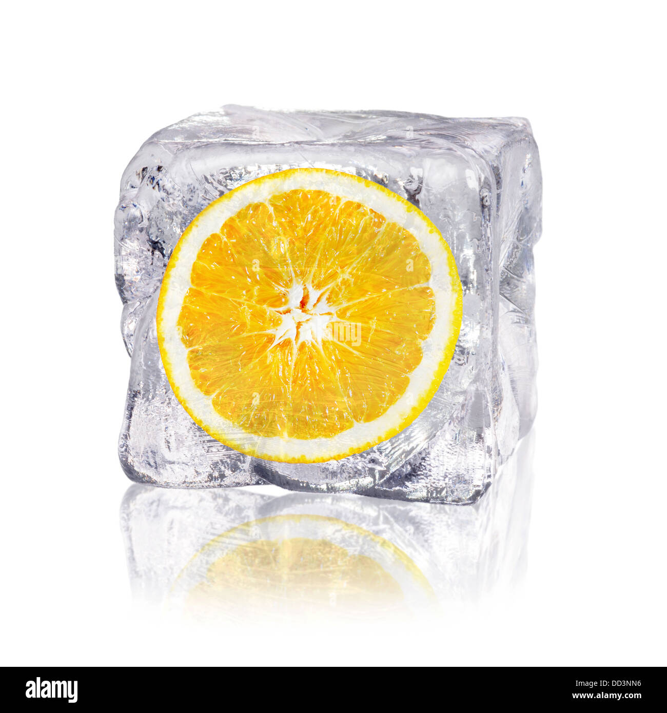 a orange enclosed in an ice cube before white background Stock Photo ...