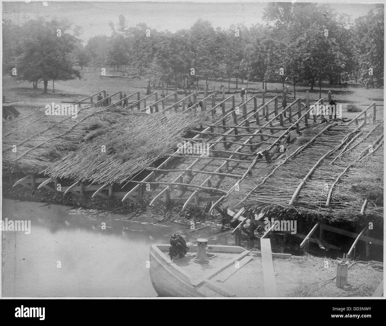 This photograph depicts two scenes. The first shows the improvement ...