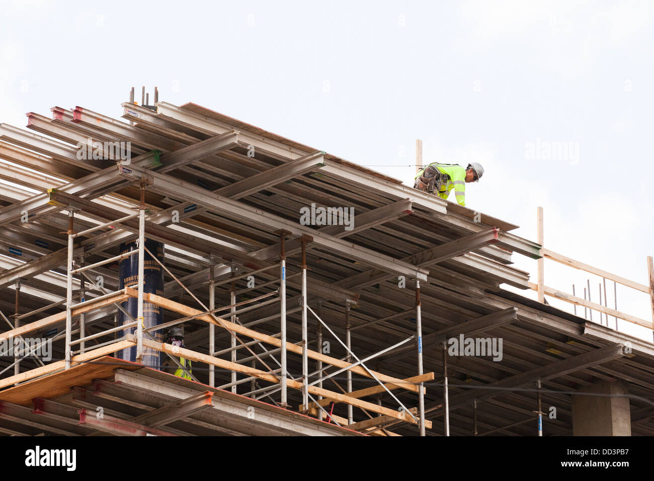 Construction worker on building Stock Photo - Alamy