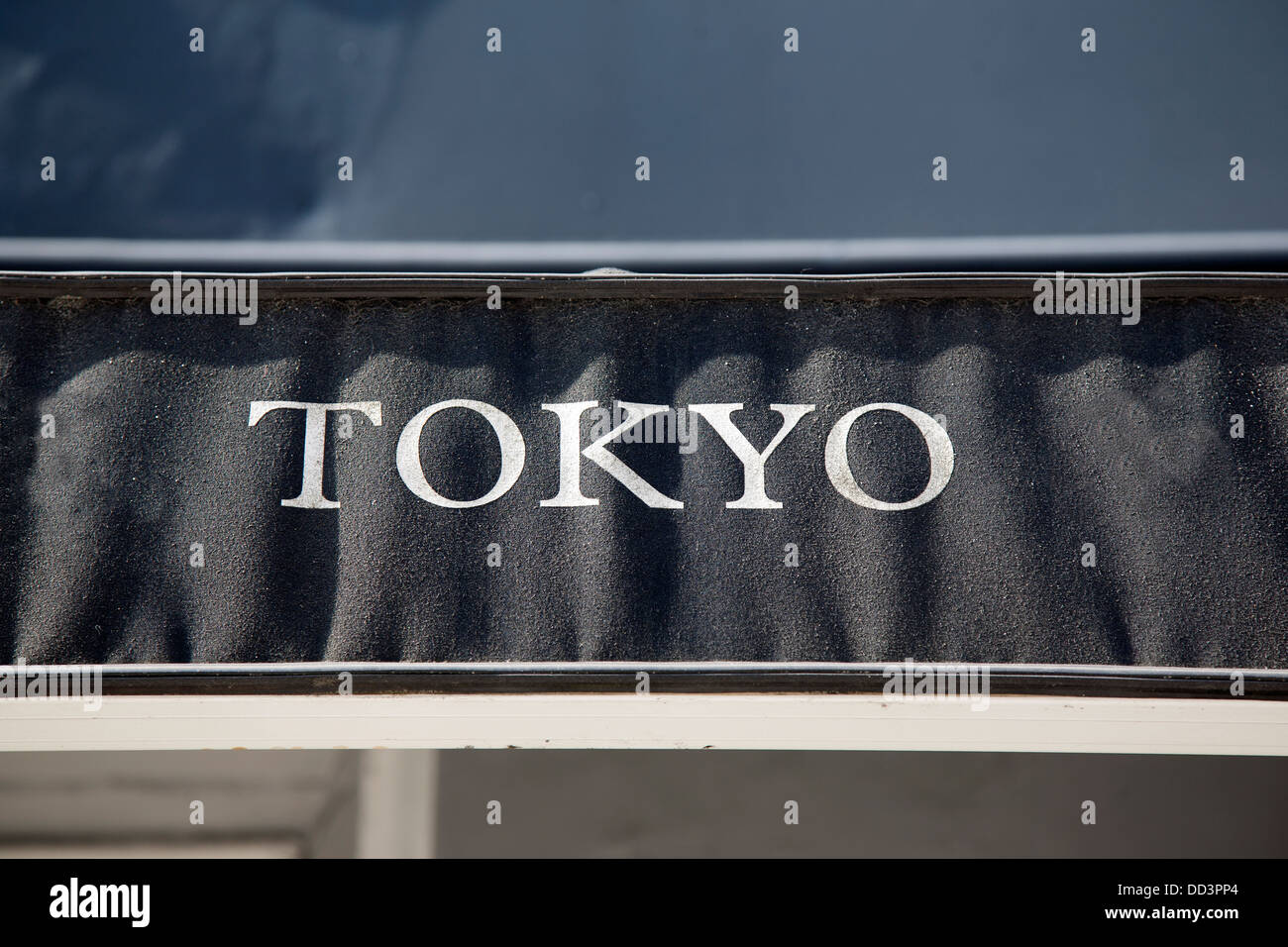 Tokyo Sign in White on Black Stock Photo - Alamy