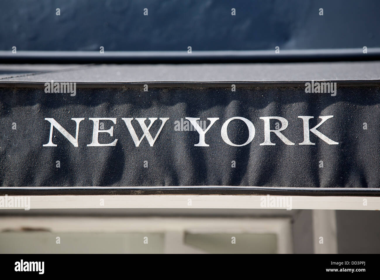 New York City Sign in White on Black Stock Photo - Alamy