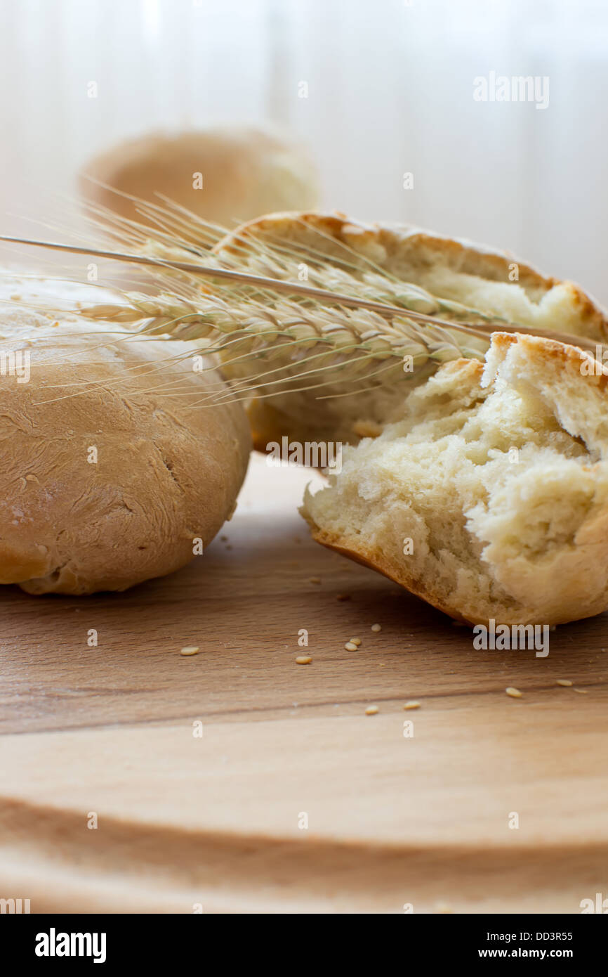 Freshly baked homemade bread and wheat classes Stock Photo - Alamy