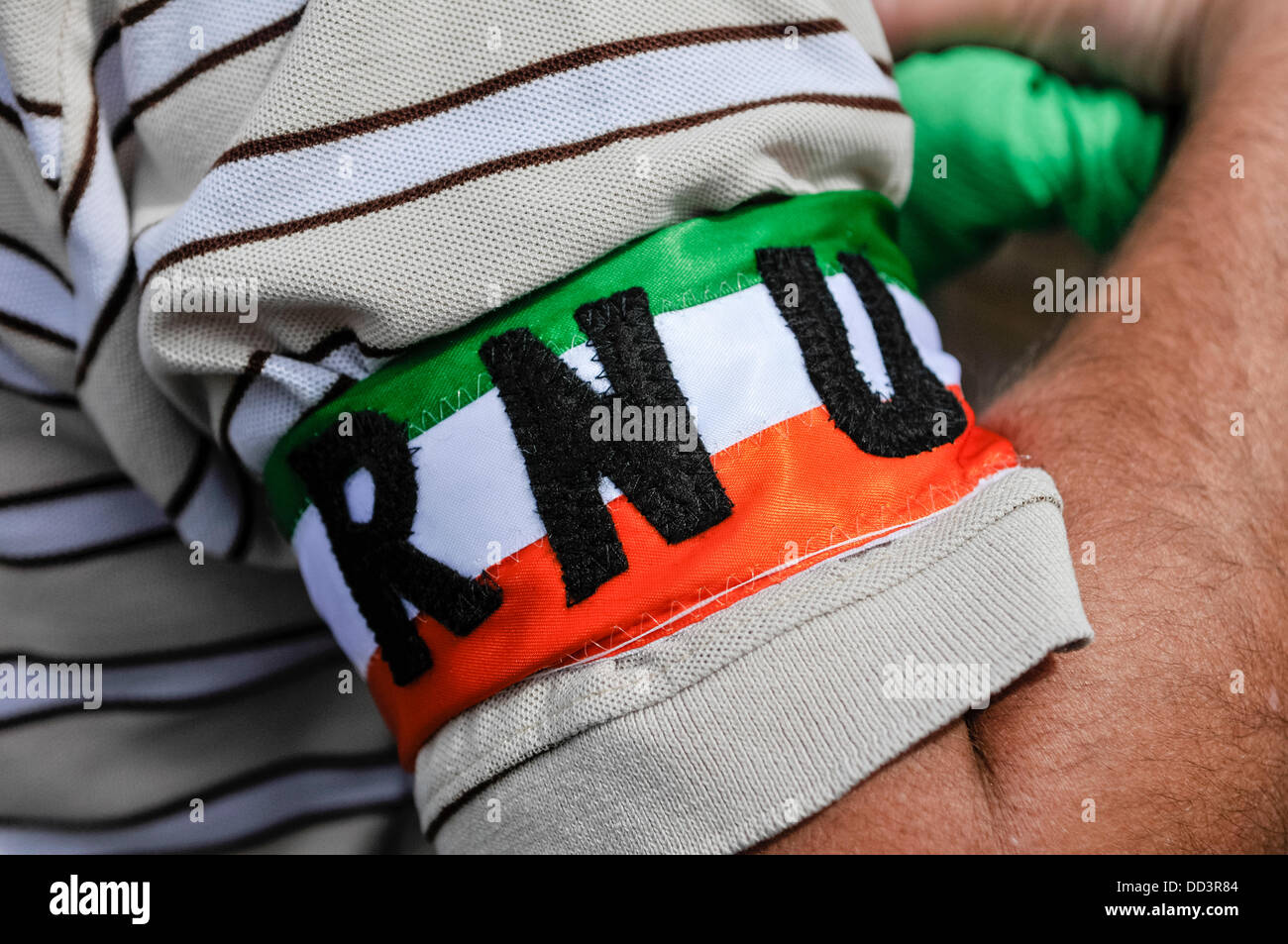 Belfast, Northern Ireland. 25th Aug, 2013. A supporter wears an RNU ...