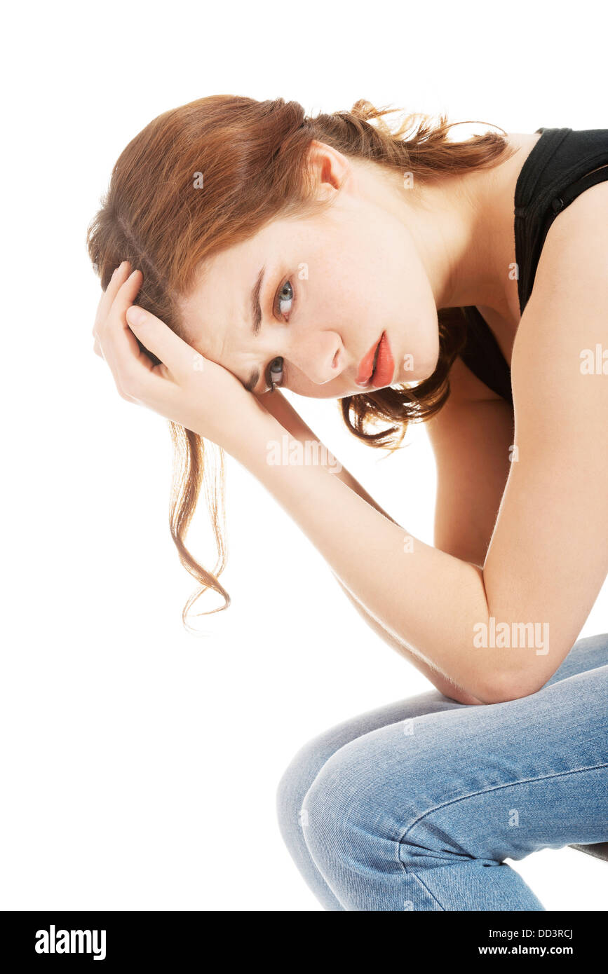 Young beautiful woman in depression. Isolated on white background Stock ...