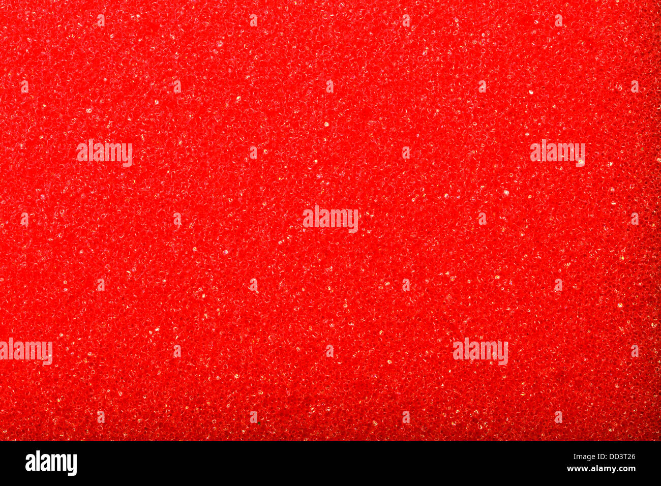Red texture cellulose foam sponge - background Stock Photo - Alamy