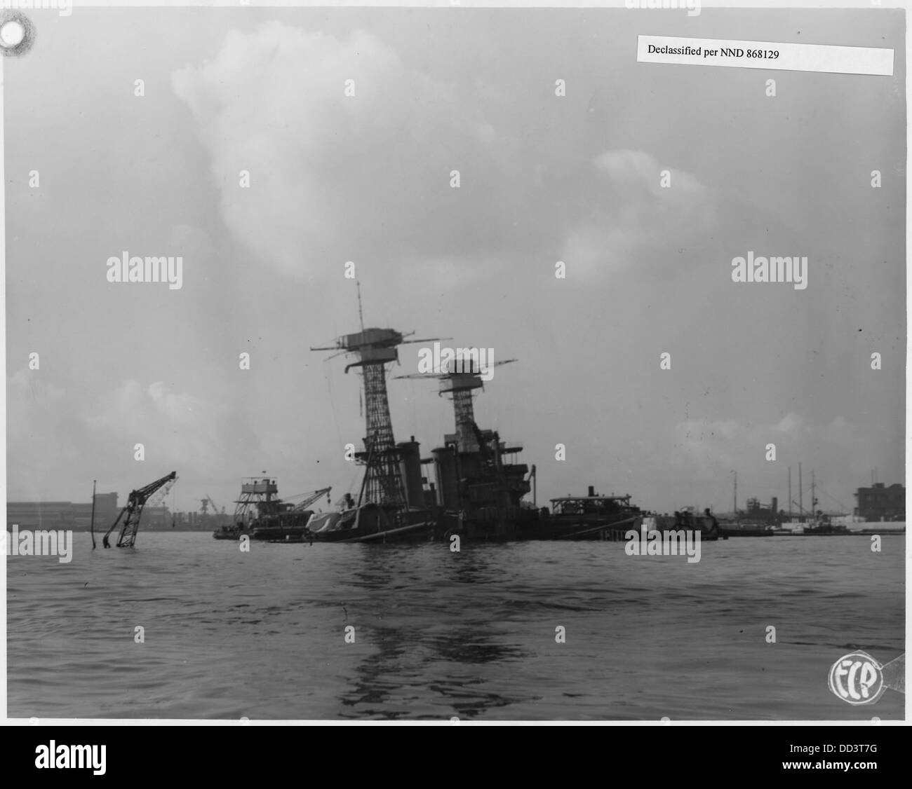 The image shows a view of the USS California from the starboard quarter ...