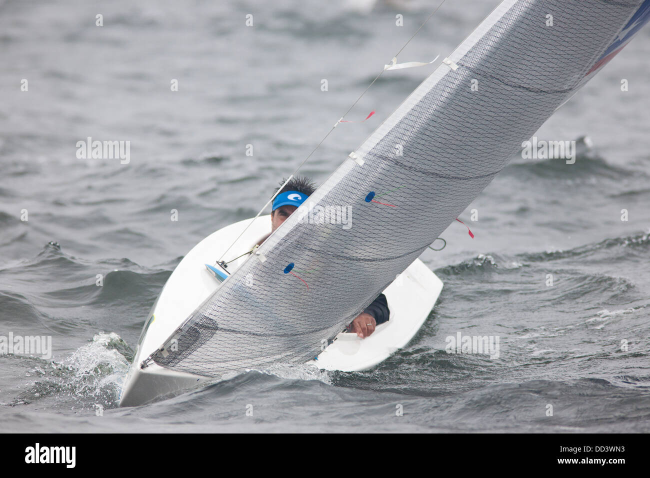 A 2.4 meter racing sailboat competing at a sailing championships in ...