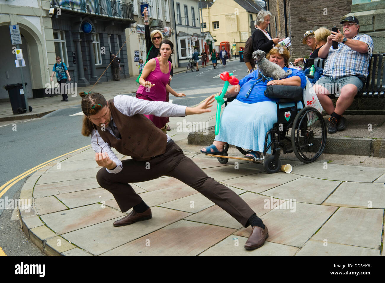street performers eco dancers on the streets of Brecon during Brecon ...