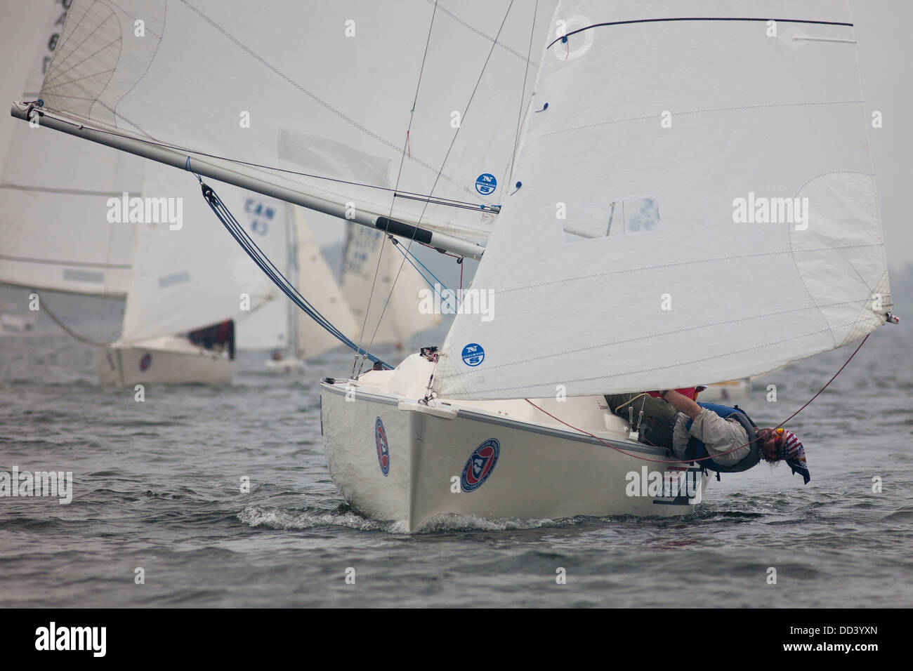 Sailors with disabilities competing at a sailing race in a Sonar Dinghy ...